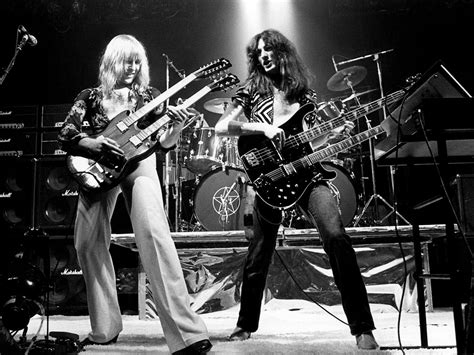 Alex Lifeson And Geddy Lee Of Rush Playing Double Neck Guitars R
