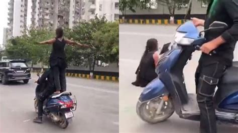 ‘titanic Pose On Moving Scooter Noida Police Impose Rs 33000 Fine