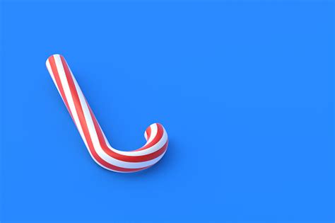 크리스마스 지팡이 파란색 배경에 빨간 줄무늬사탕 새해 축하 개념 전통적인 달콤한 디저트 공간을 복사합니다 3d 렌더 3차원