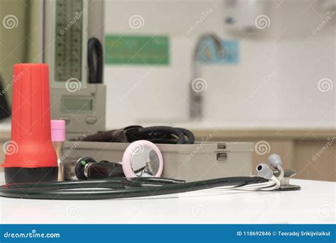 Neurological Examination The Neurologist Testing Reflexes On A Female