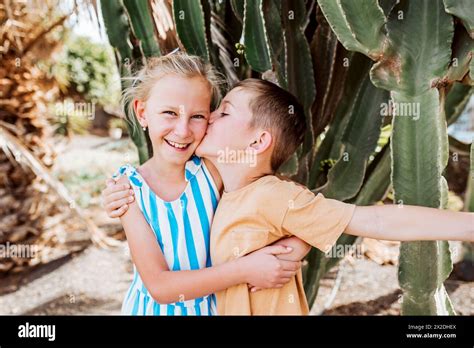 Portrait Of Siblings On Summer Vacation In Holiday Destination Happy