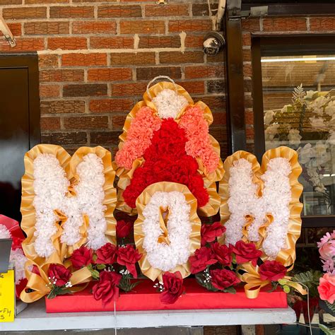 Mom With Angel Extraordinary Floral Creations Floraltology Llc