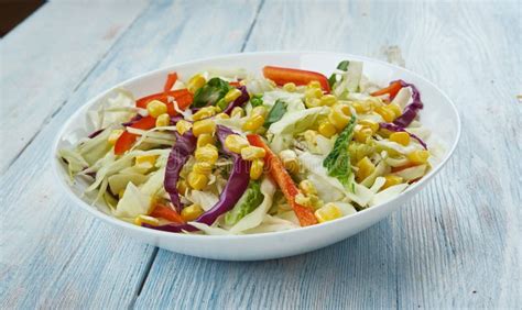 Mexican Coleslaw Salad With Beans Corn Pepper And Herbs Closeup In A