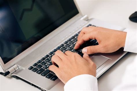 premium photo man typing computer keyboard