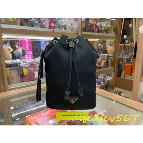 《ann國際精品》prada 普拉達 黑色尼龍 銀三角牌 抽繩束口 水桶包 單肩包 斜背包 1ns369 蝦皮購物