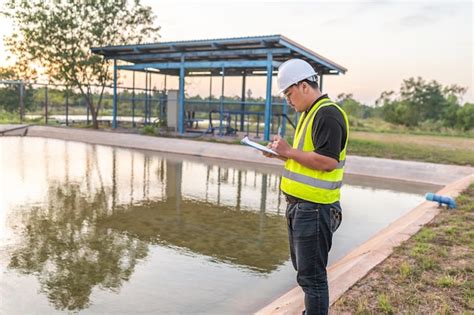 Premium Photo Environmental Engineers Work At Wastewater Treatment