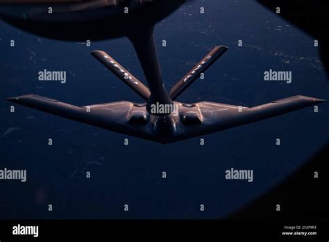 A Kc 135 Stratotanker Refuels A B 2 Spirit Over The Skies Of Missouri