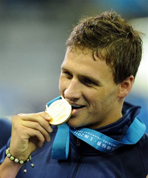 组图：罗切特夺冠超淡定 飞速游行激起浪花朵朵 搜狐体育