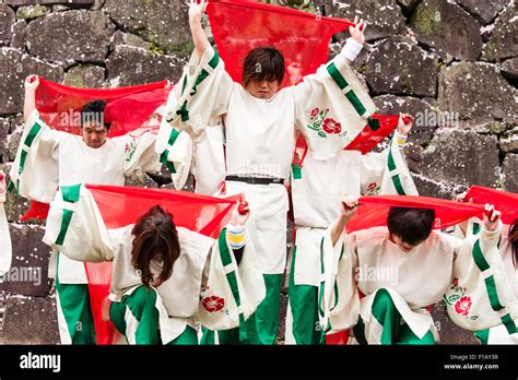 Japanese Yosakoi Dance Team Dancers Wearing White And Green Costumes