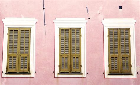 Premium Photo Low Angle View Of Windows On Building