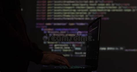 Hacker Writing Code Cracking Computer Programming Code In The