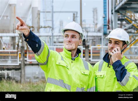 Engineer Oil And Gas Refinery Pipe Service Team Worker Working Together