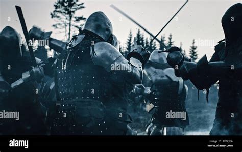 Epic Battlefield Armies Of Medieval Knights Fighting With Swords