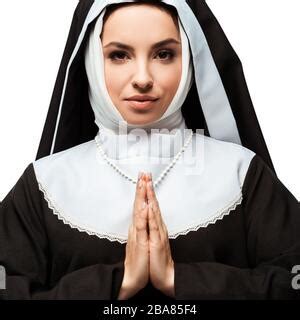 Beautiful Smiling Nun Praying With Hands Together Isolated On White