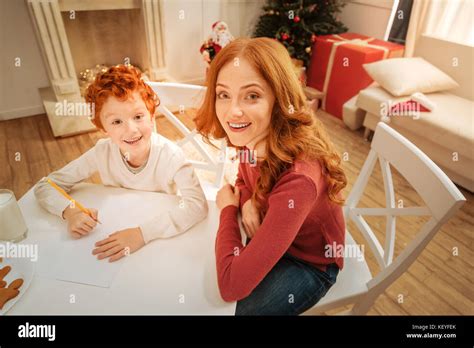 Joyful Mother And Son Smiling Into Camera Stock Photo Alamy