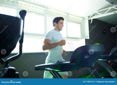 Man Doing Cardio Training Program In Fitness Center Stock Image Image