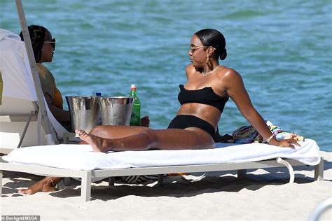 Kelly Rowland Shows Off Her Sculpted Bikini Body In A Black Two Piece