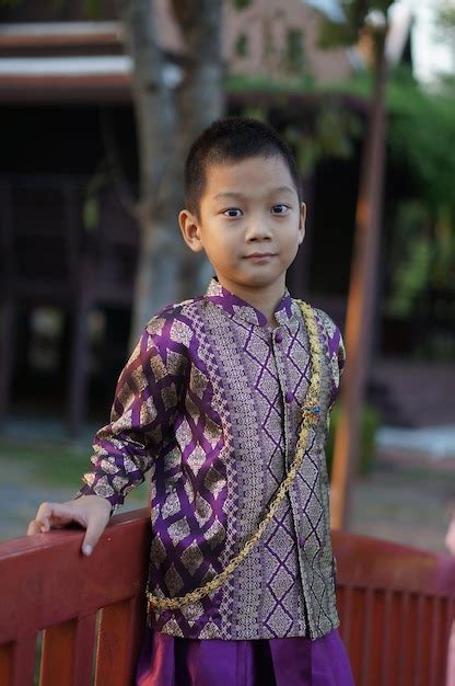 Premium Photo Portrait Of Cute Girl Standing Outdoors