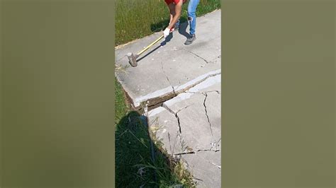 how to break concrete with 16 pound sledgehammer - YouTube