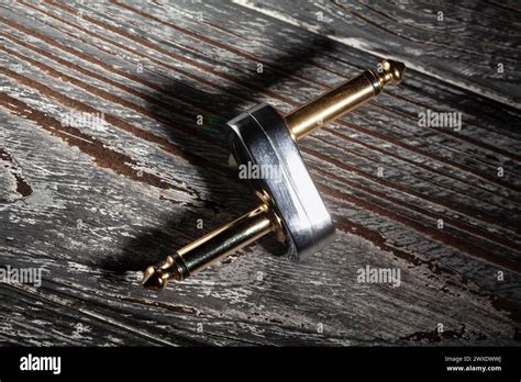 Guitar Pedal Slider Plug On Wood Background Stock Photo Alamy