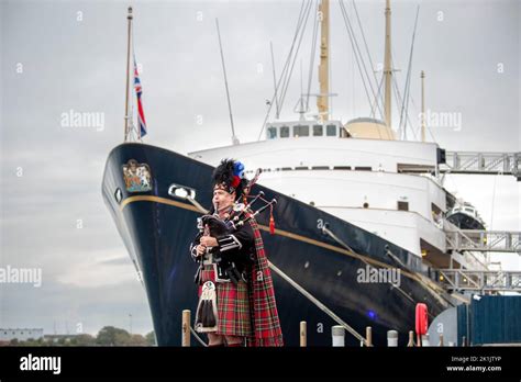 A Piper Plays A Lament Piper Aboard The Royal Yacht Britannia Moored