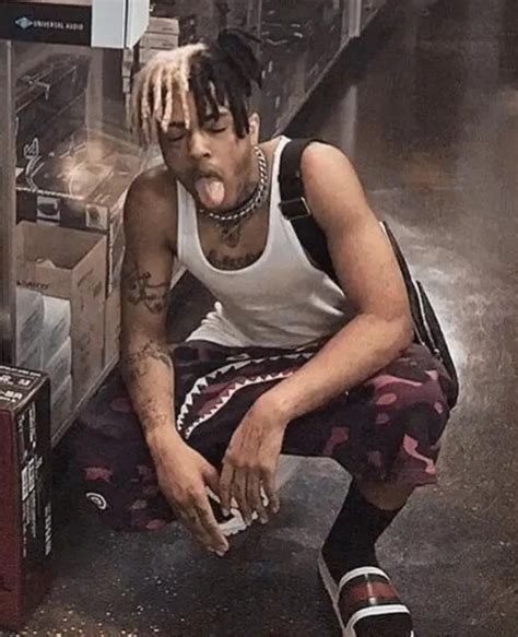 Xxxtentacion Purple Print Sweat Shorts And White Slide Sandals Iconic Celebrity Outfits