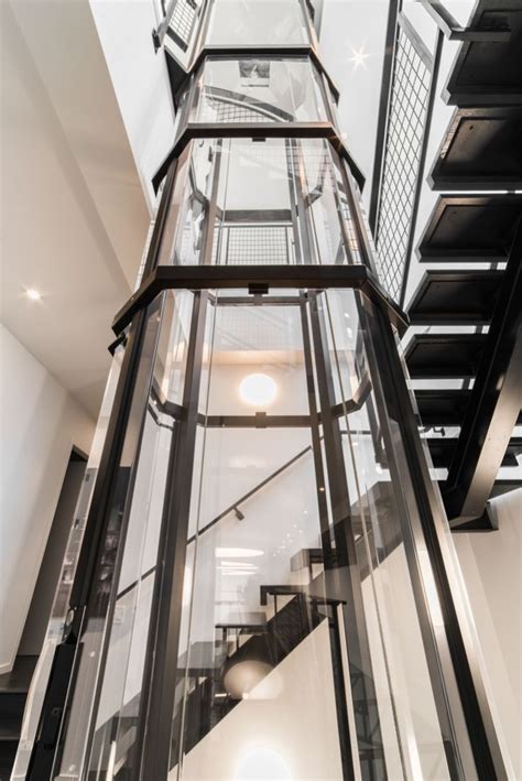 Savaria Vuelift Glass Home Elevator With Modern Wrap Around Stairs