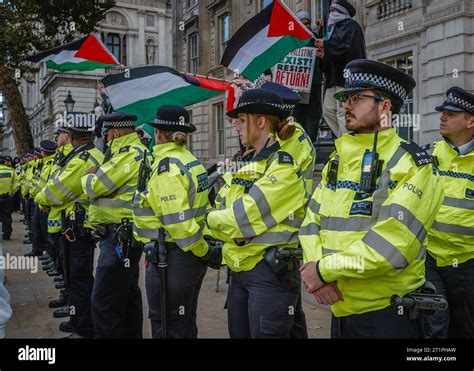 Met Police Officers Stand Guard Near Downing Street During The Pro