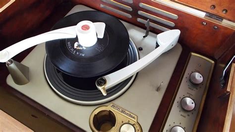 Rca Automatic 45 Spindle Adapter Used To Play A Stack Of 45 S Youtube
