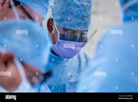 model released spinal surgery team members of a surgical team working