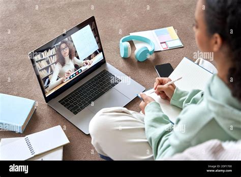 Teenage Girl Distance Learning Online Video Call Class With Remote