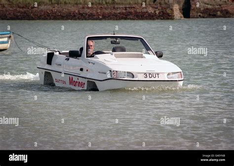 Inventor Tim Dutton With His Carboat The Dutton Mariner In And Around