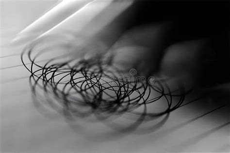 Close Up Photo A Hand Scribbling Circles On A Notebook Paper Motion