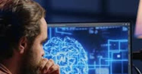 Teleworking It Employee Runs Ai Script On Computer From Home Office