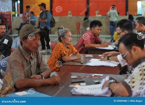 Poor People Queued Cash Assistance From The Government Editorial Image