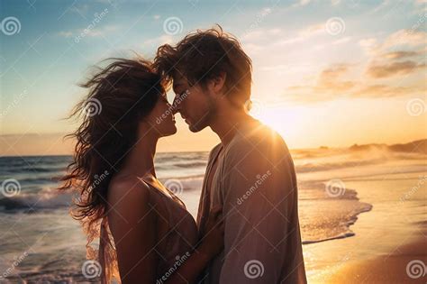 Against The Backdrop Of A Breathtaking Sunset A Deeply In Love Couple