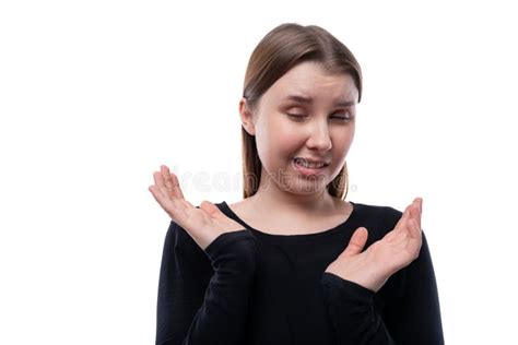 Portrait Of A European Schoolgirl With A Puzzled Look On Her Face Stock