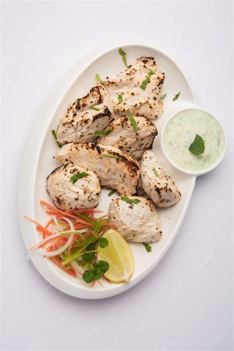 Premium Photo Indian Afghani Chicken Malai Tikka Is A Grilled Murgh