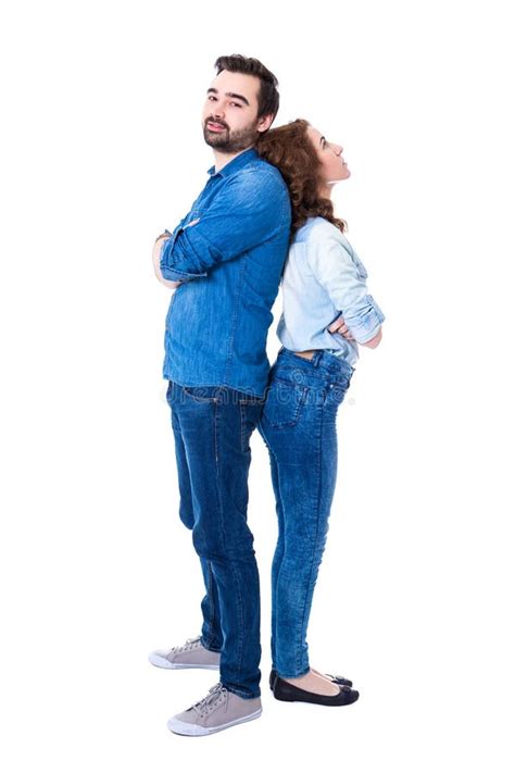 Full Length Portrait Of Young Couple Isolated On White Stock Image