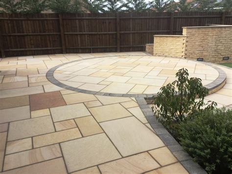 Restoring The Spoiled Appearance Of A Sandstone Tiled Patio In Bedford