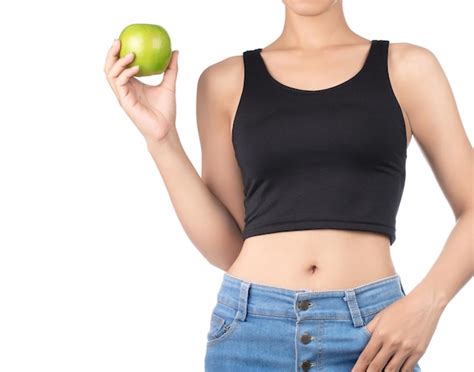 Mulher Comendo Uma Maçã Verde Isolada No Fundo Branco Foto Premium