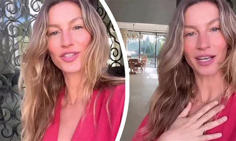 Gisele Bundchen Flashes Her Chest In A Revealing Red Robe As She Talks