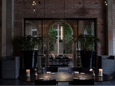 Moody Interiors Of Le Pristine Restaurant Take Cues From The Old Masters
