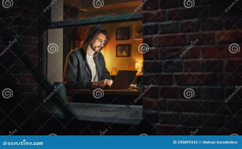Professional Male Programmer Writing Code For Complex Project And