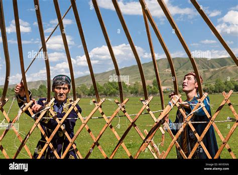 Kazakh People Building A Nomadic Tent Known As Yurt In Saty Village