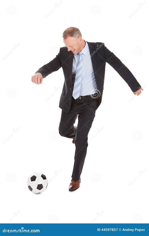 Businessman Kicking Soccer Ball Stock Image Image Of Profession