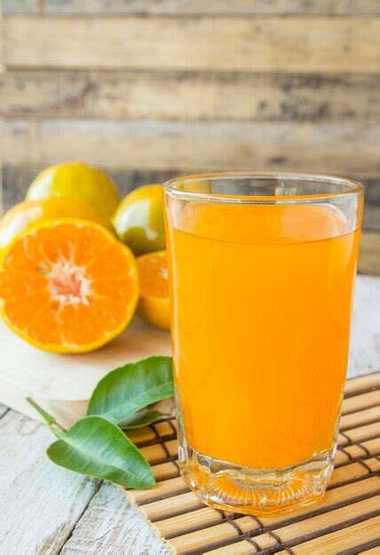 Premium Photo Orange Juice On Table