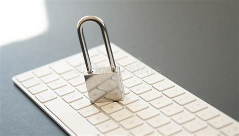 Stainless Padlock On Computer Keyboard Pc Network Security Data Security And Antivirus