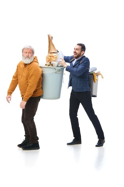 Premium Photo Senior And Man In His S Holding Trash Bins On Backs Cleaning Garbage Taking Care