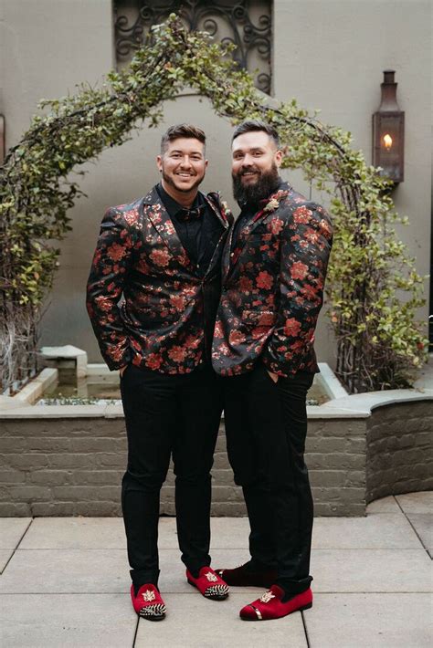 Two Grooms In Black Suit Jackets With Burgundy Flowers Red Velvet Shoes